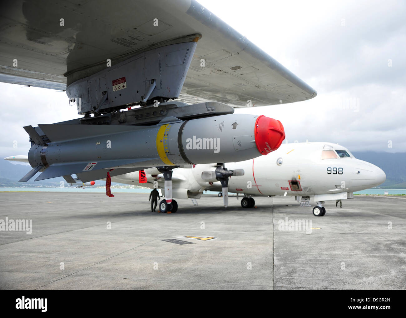 An AGM-65 Maverick tactical missile is mounted on a P-3C Orion Stock ...