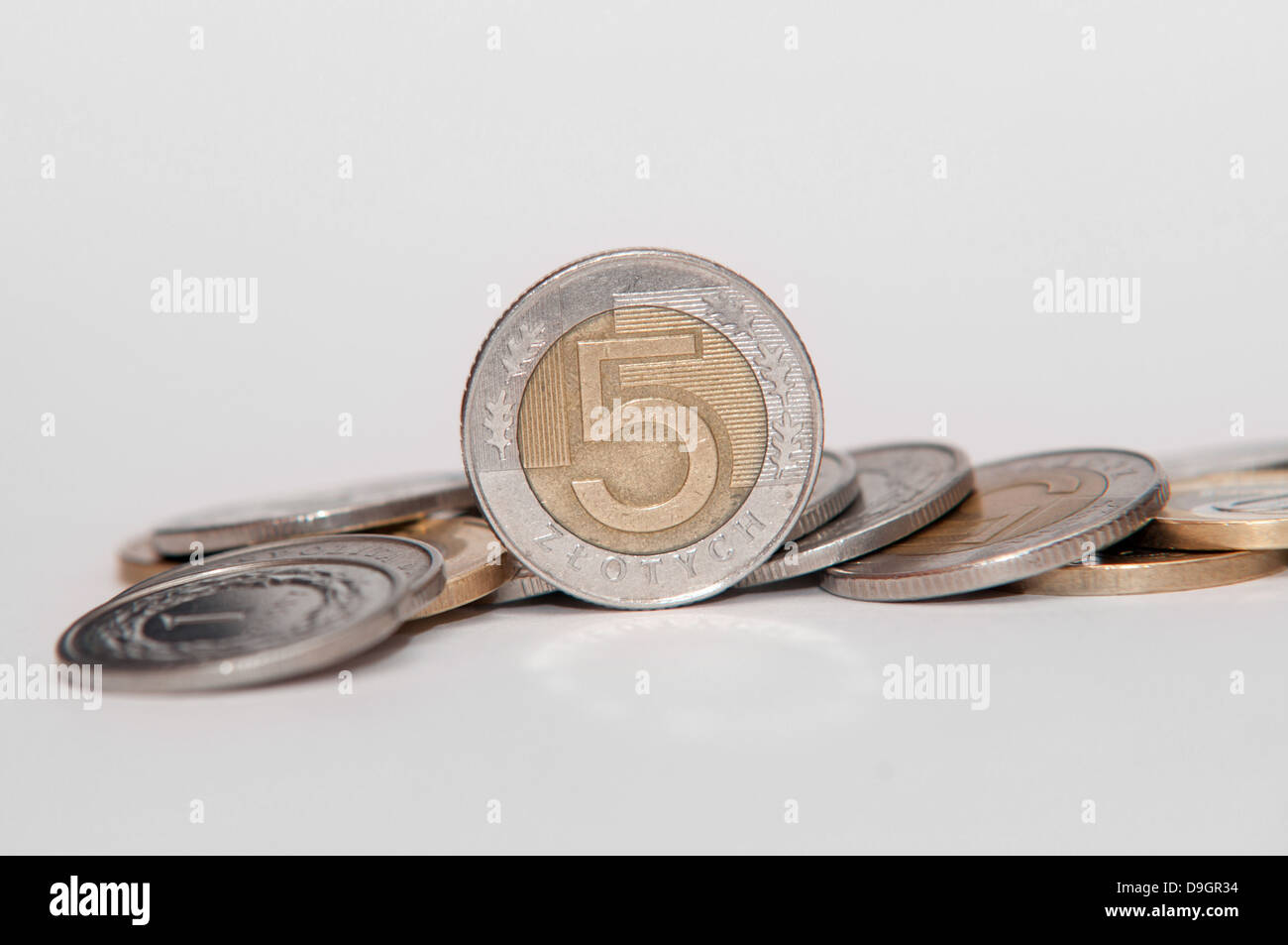 Polish 5 Zloty coins white background Stock Photo - Alamy