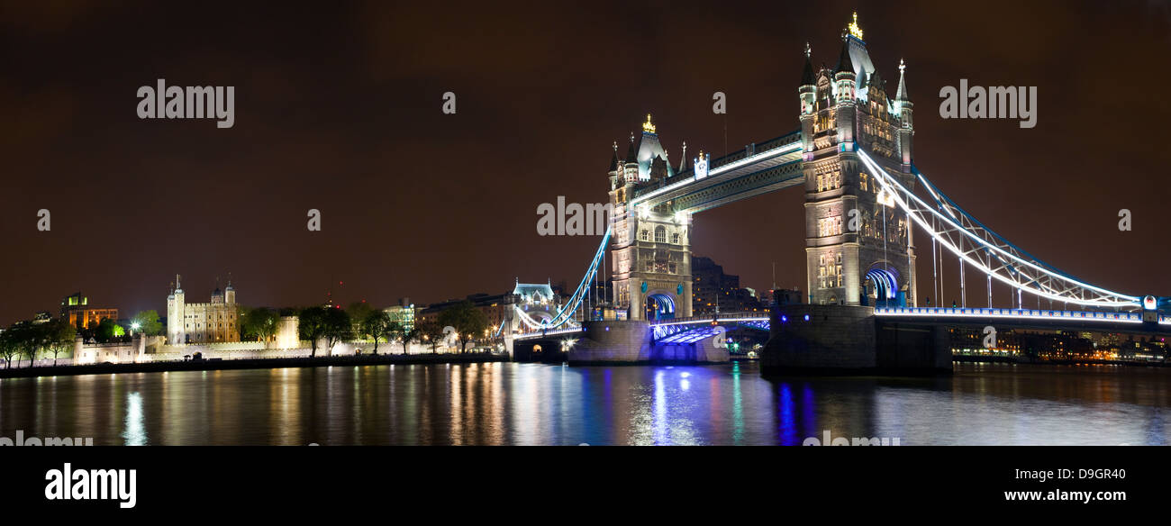 Panoramic view at night, taking in the sights of Tower Bridge and the ...