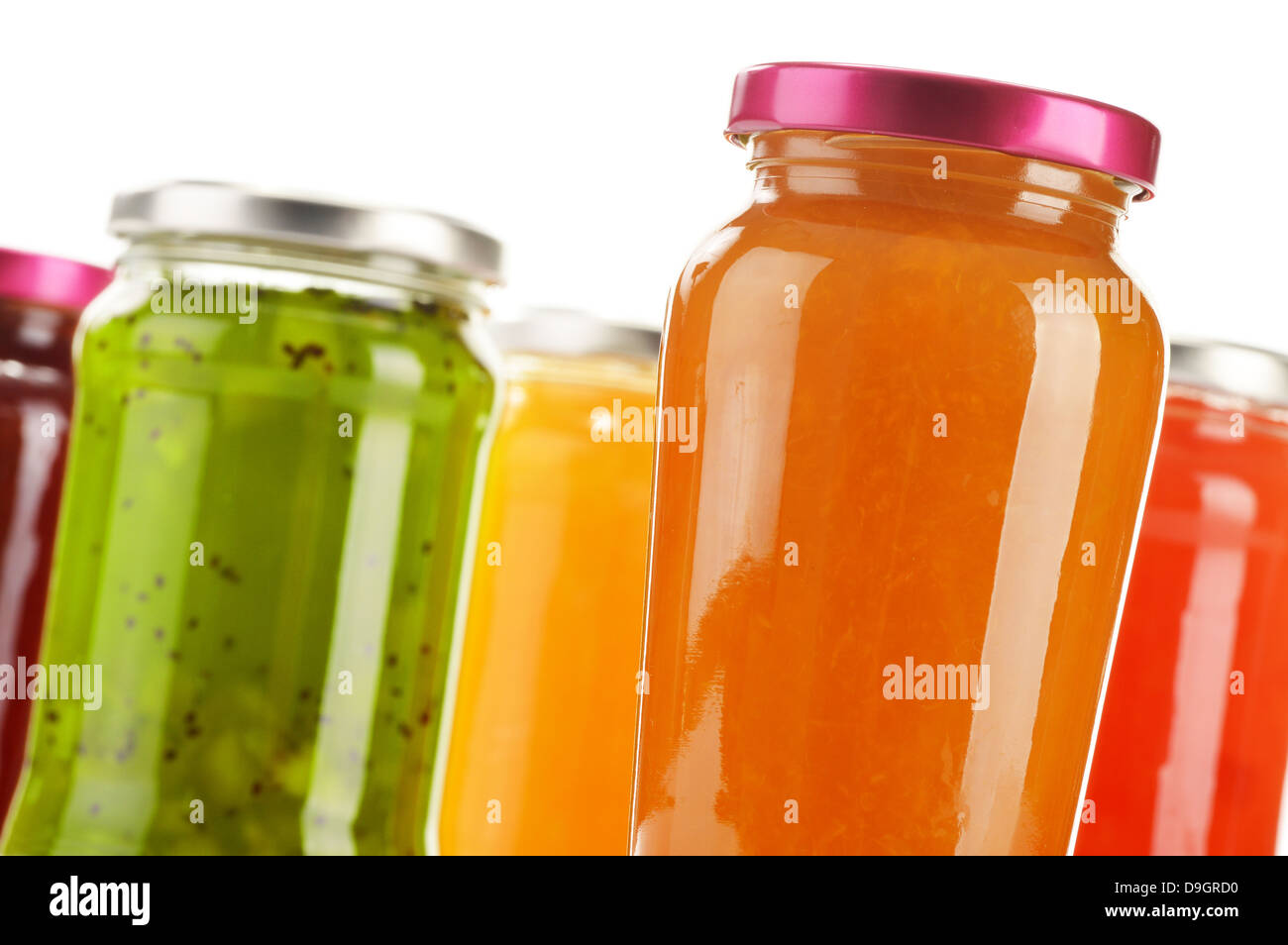 Composition with jars of fruity jams on white. Preserved fruits Stock ...