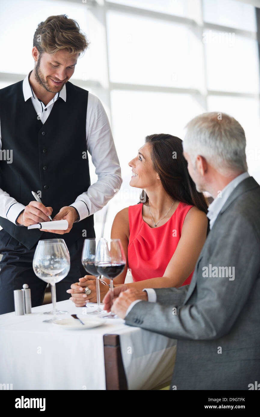 Waiter taking order from man hi-res stock photography and images - Alamy
