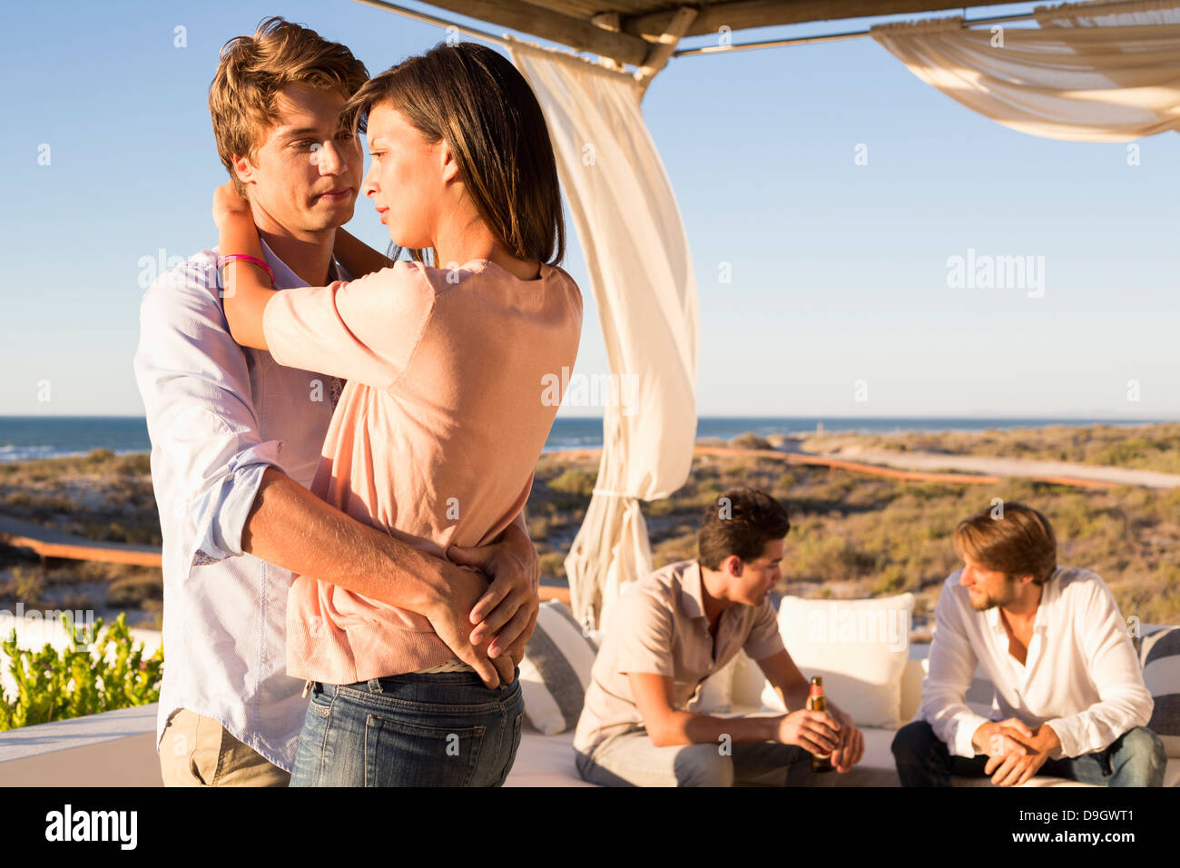 Couple dancing in a party Stock Photo - Alamy