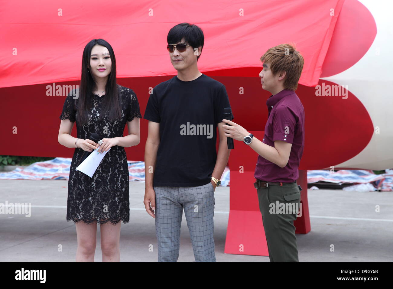 Byeong-ki Ahn and Sienna Li at press conference of movie Bunshinsaba 2 in Shanghai, China on ...