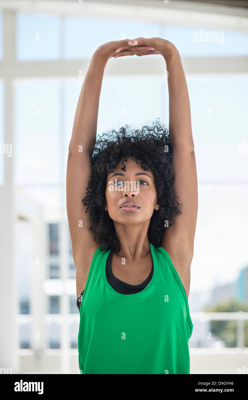 Woman stretching out her arms Stock Photo - Alamy