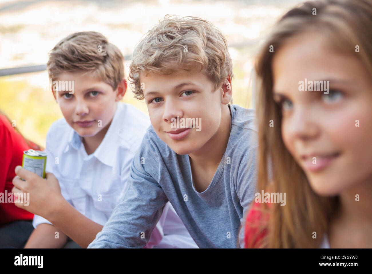 Friends smiling together Stock Photo - Alamy