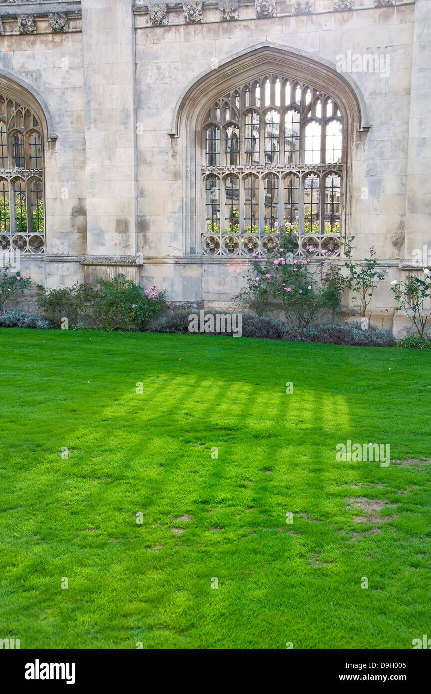Shadow of stone window on lawn of Kings College Cambridge Stock Photo ...