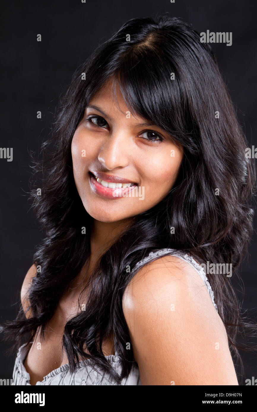 beautiful young Indian woman portrait on black background Stock Photo ...