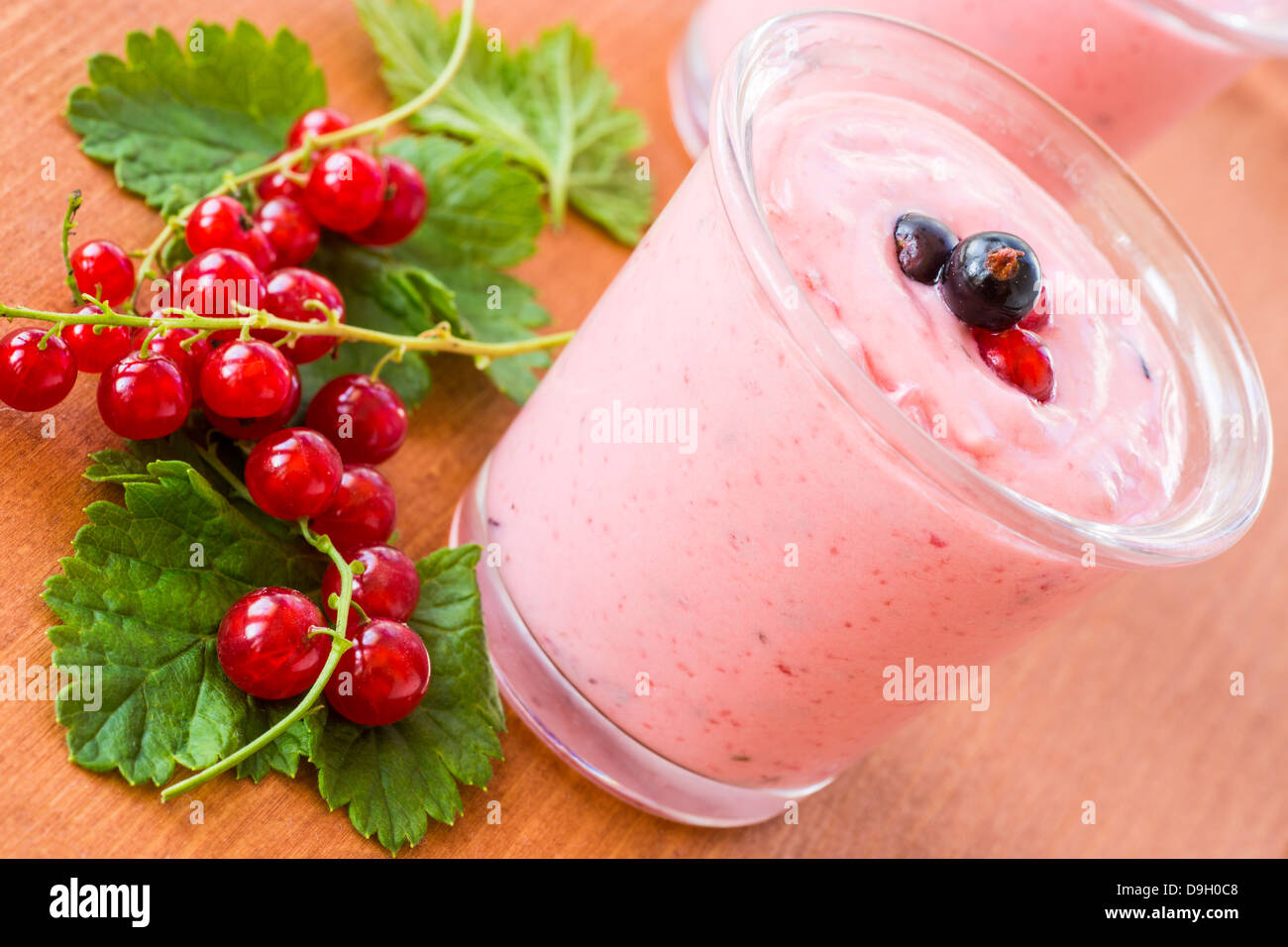 summer smoothies red currant in the cup on the wooden table Stock Photo ...