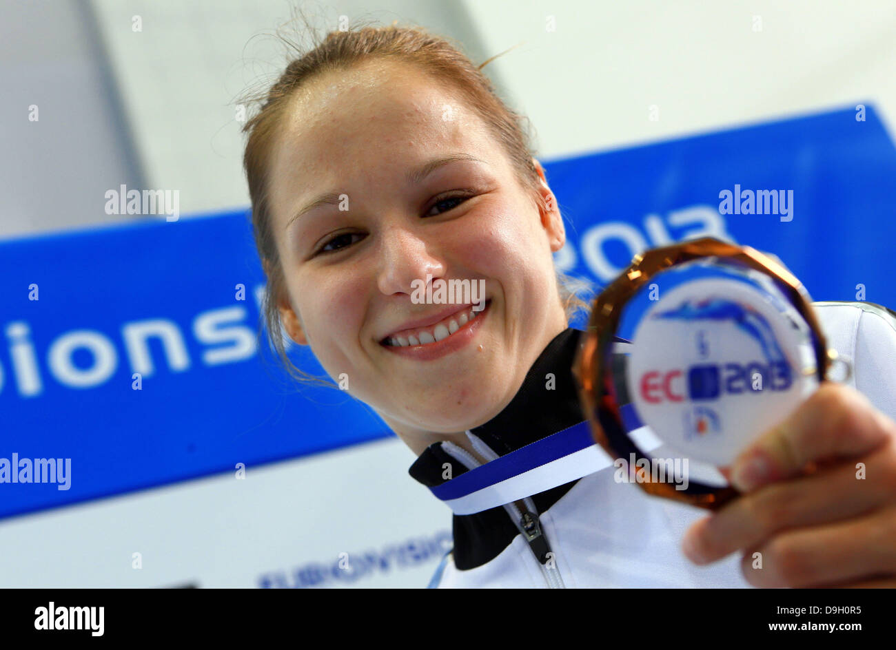 Rostock, Germany. 19th June, 2013. German Maria Kurjo shows her bronze ...