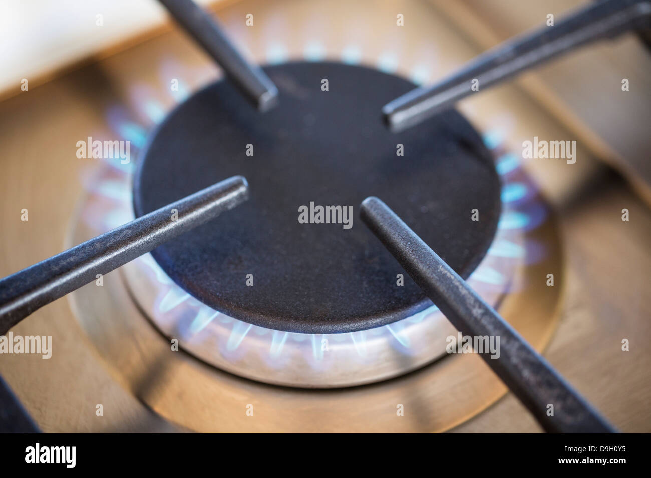 Close-up of a gas stove burner Stock Photo - Alamy