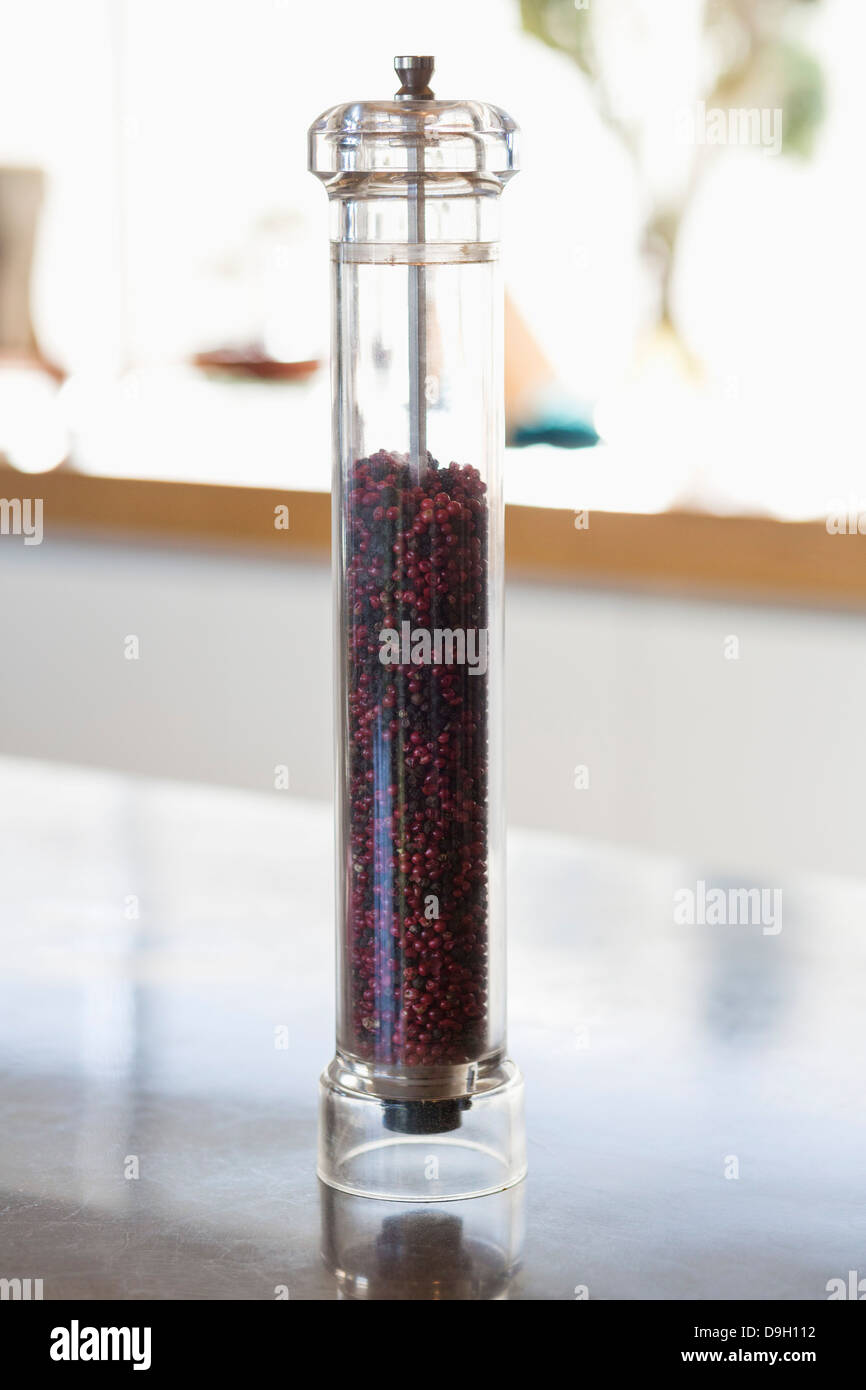 Pepper mill at a kitchen counter Stock Photo - Alamy