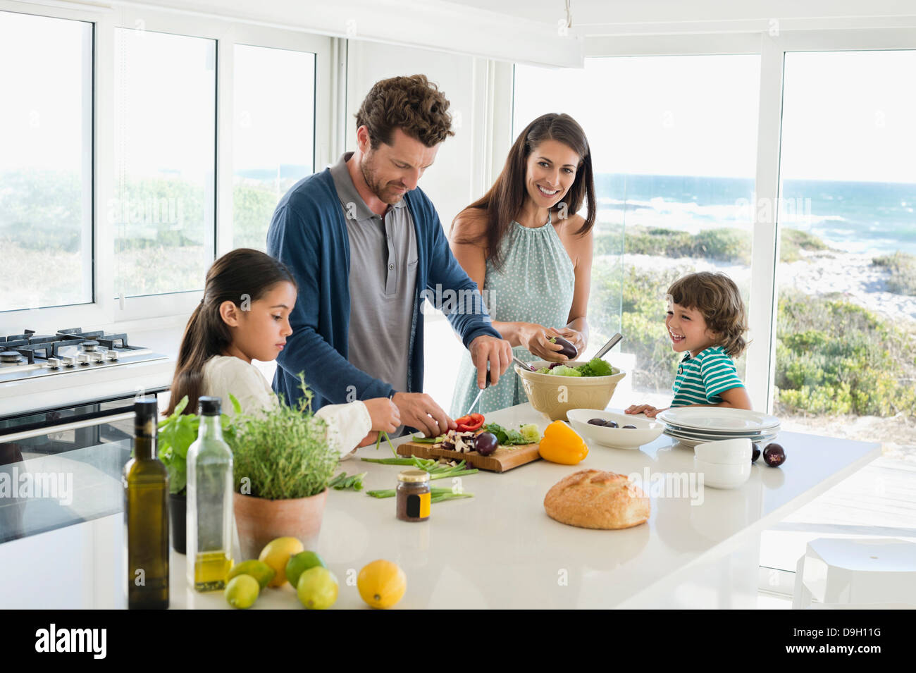 Family preparing food Stock Photo - Alamy