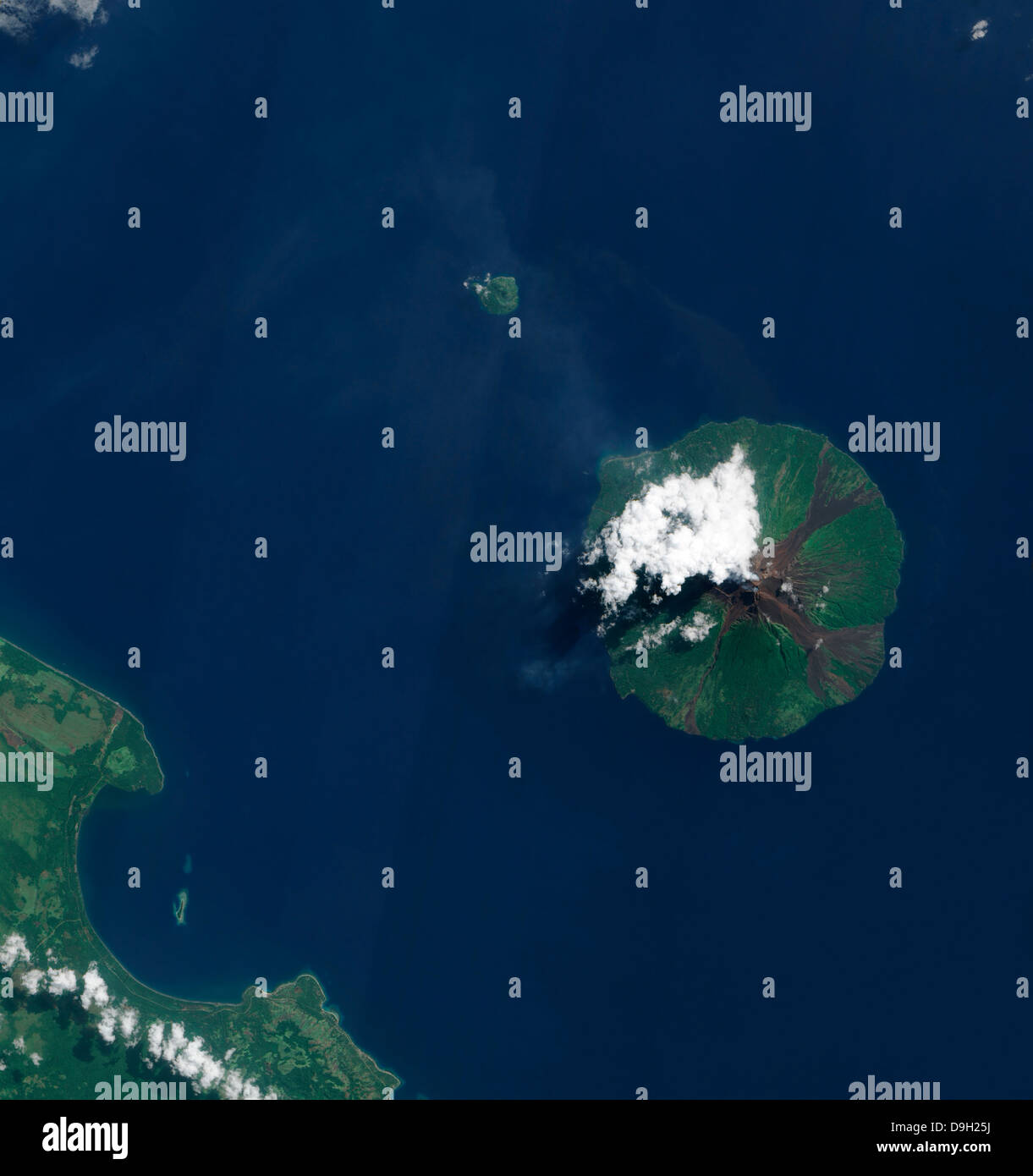 Papua New Guinea's Manam Volcano releases a thin, faint plume over the ...