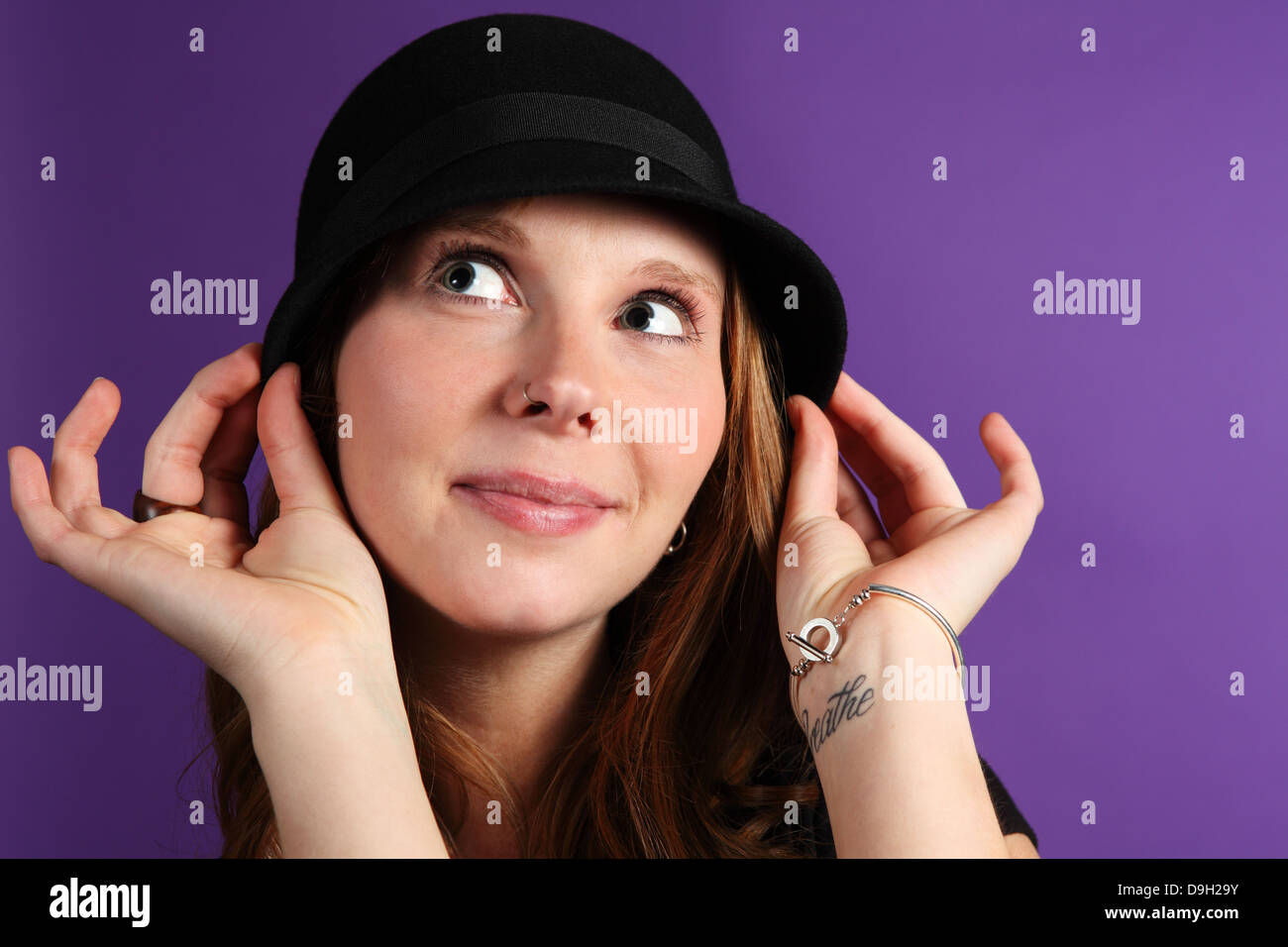 Portrait of a pretty, young woman with cute, playful expression Stock ...