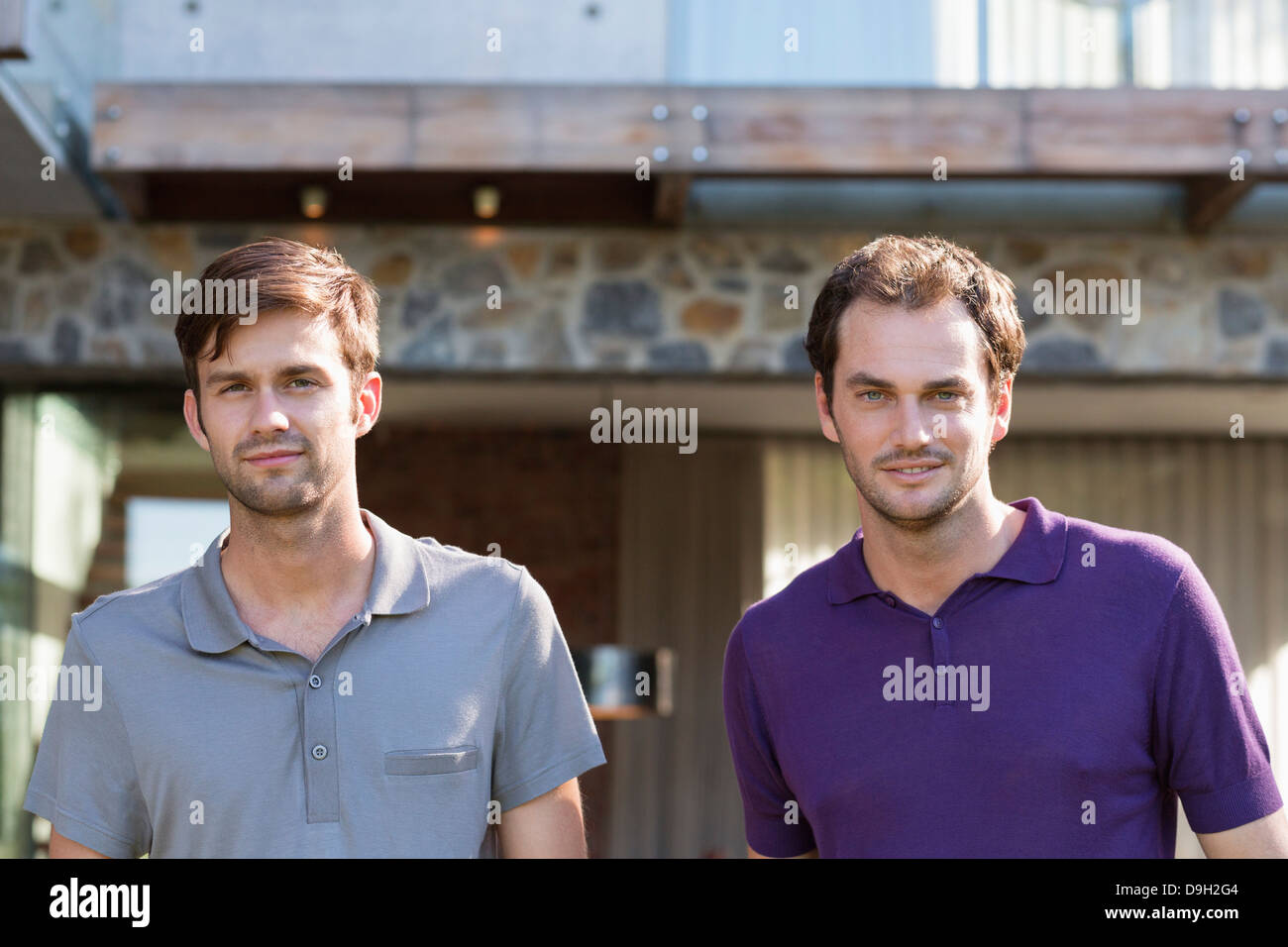 Portrait of two male friends smiling Stock Photo - Alamy