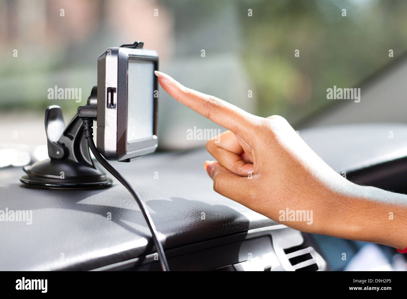 finger pointing at car GPS navigation system Stock Photo - Alamy
