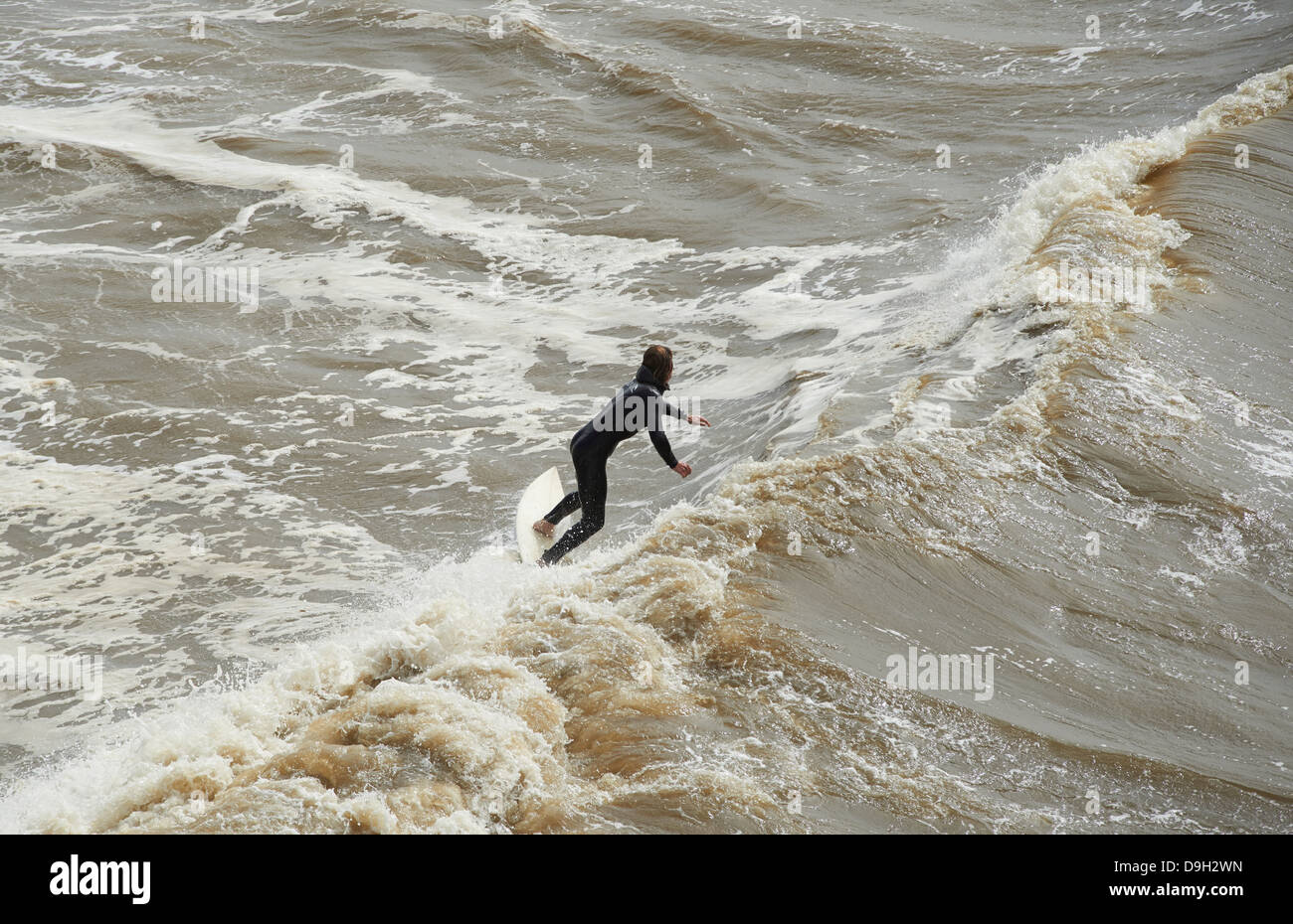 Surfer waiting for wave Stock Photo - Alamy