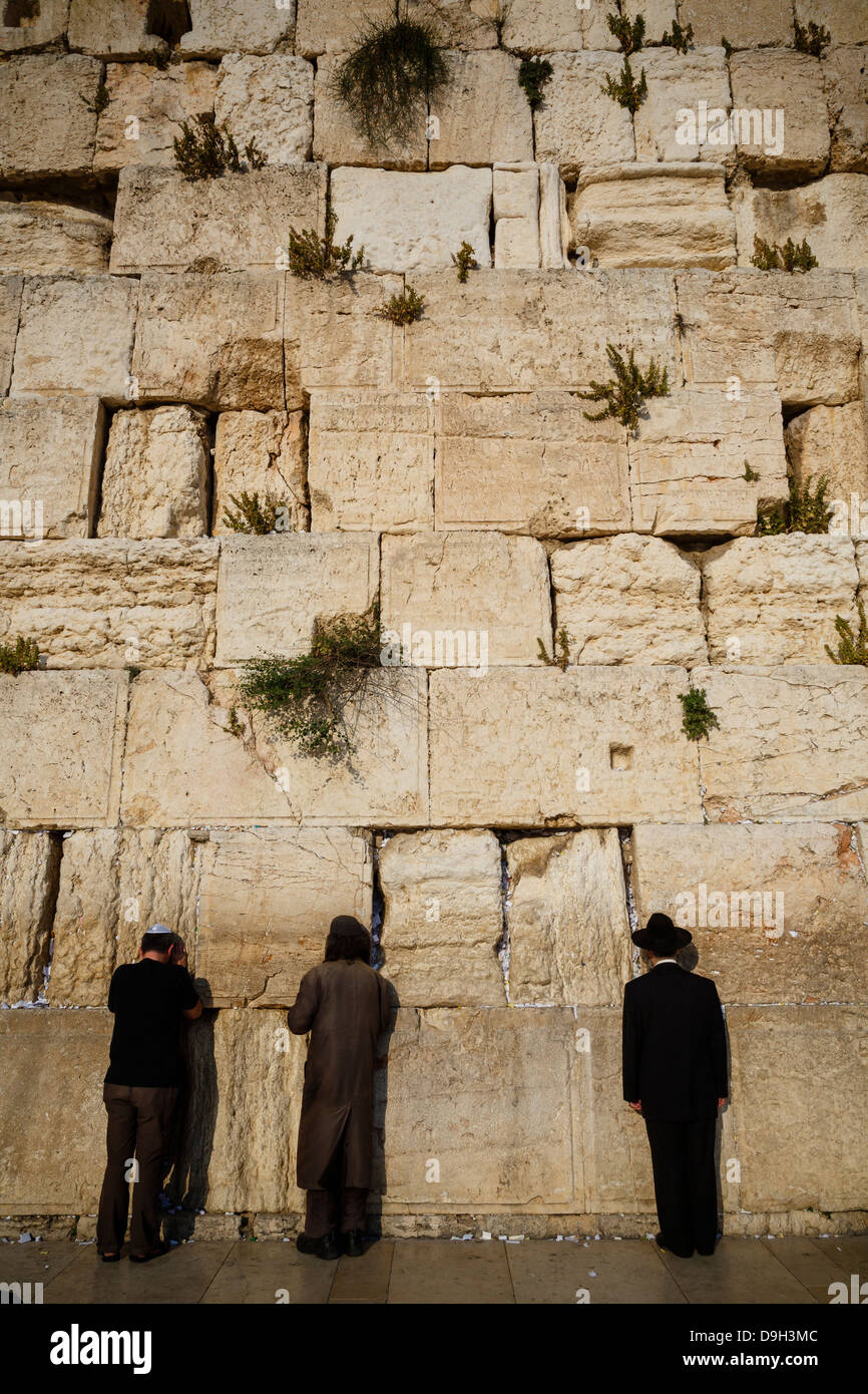 Jewish people praying at the wailing wall known also as the western ...