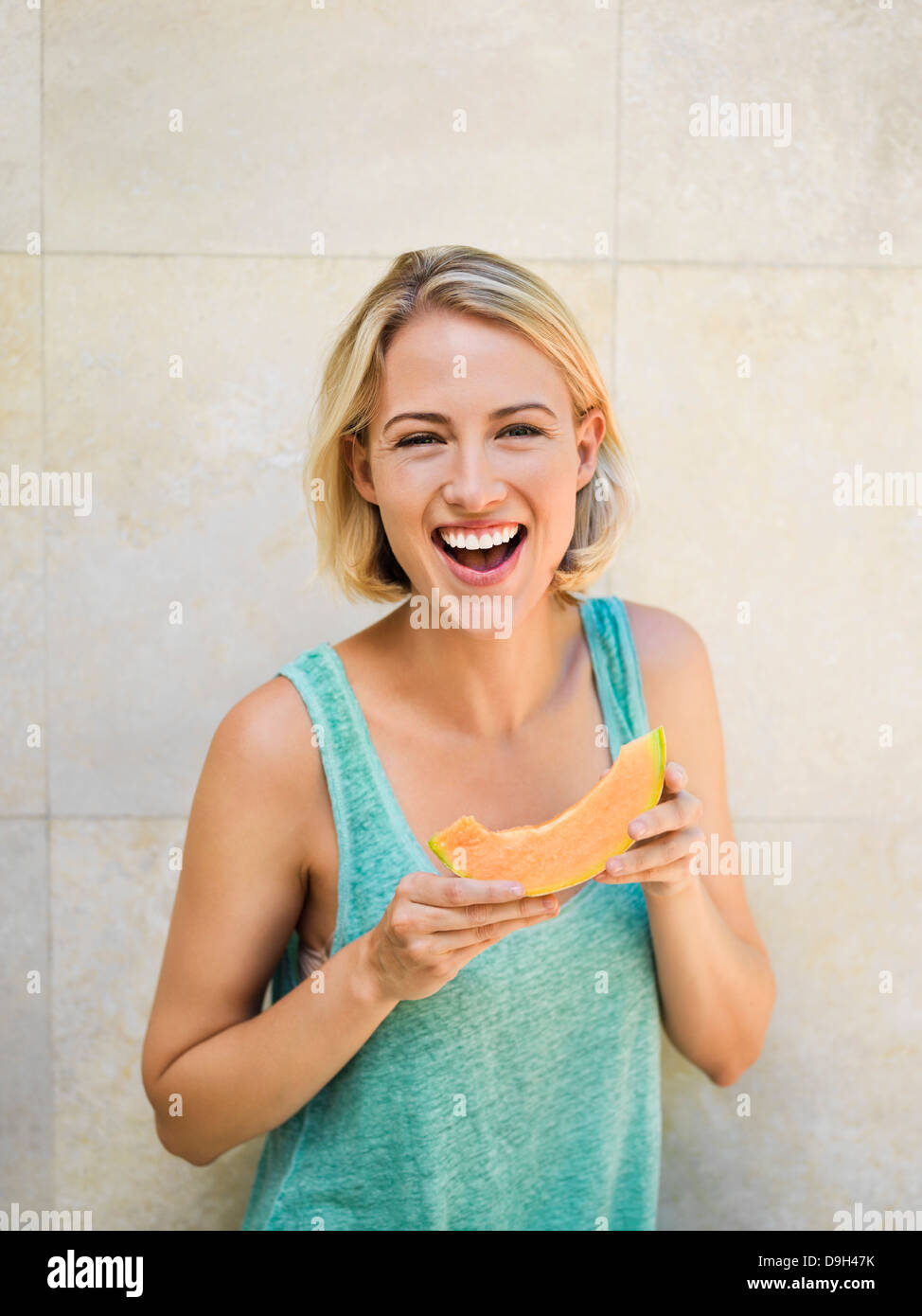 Female eating melon hi-res stock photography and images - Alamy