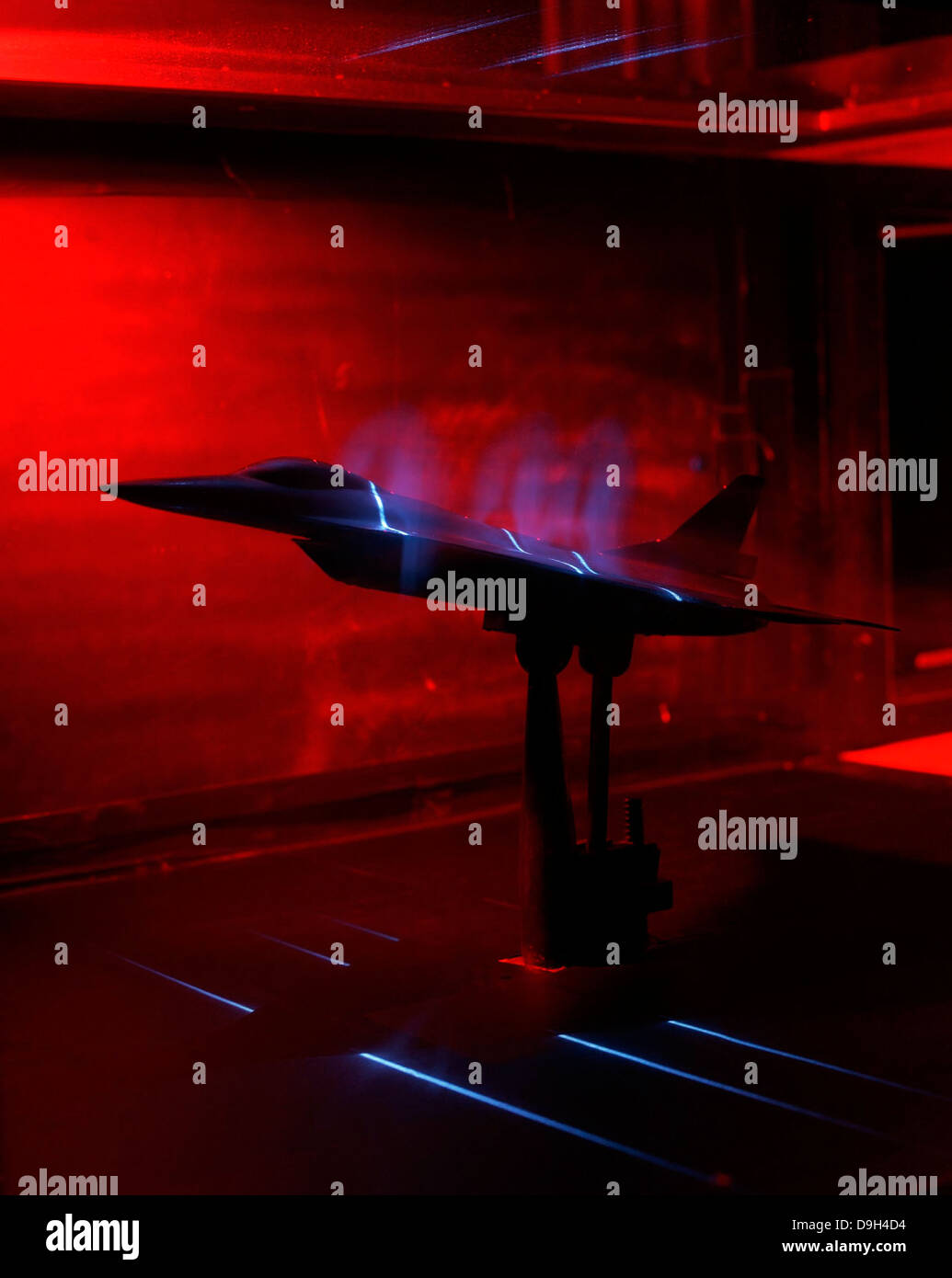 A basic flow visualization test of an F-16XL Scamp model Stock Photo ...