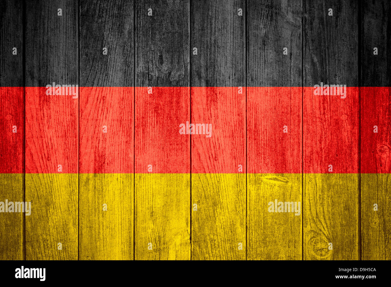 Flag of Germany or black, red and yellow German banner on wooden ...