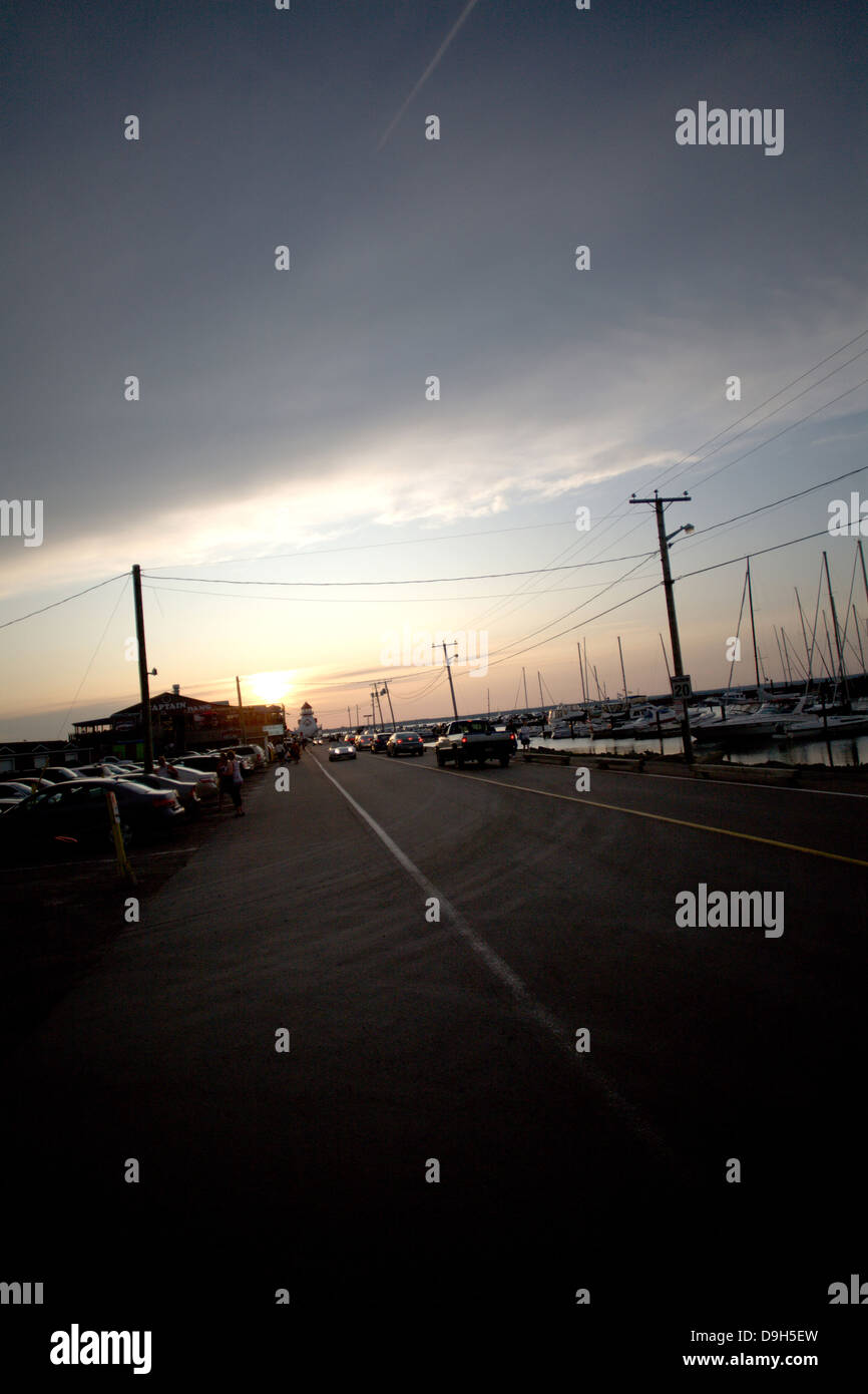 A sunset at the Pointe-du-Chêne Wharf located in Shediac, New Brunswick ...