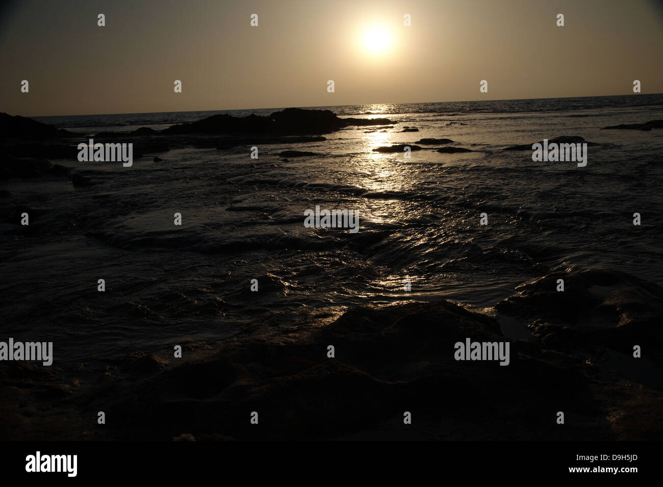 Intense colors sunset over sea, nature background Stock Photo - Alamy