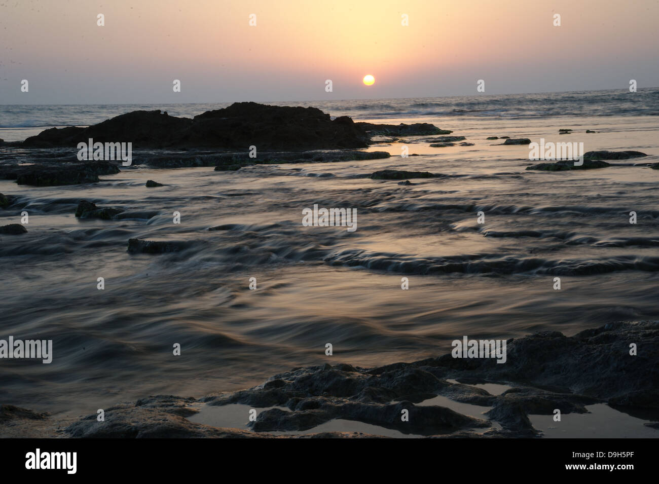 Intense colors sunset over sea, nature background Stock Photo - Alamy