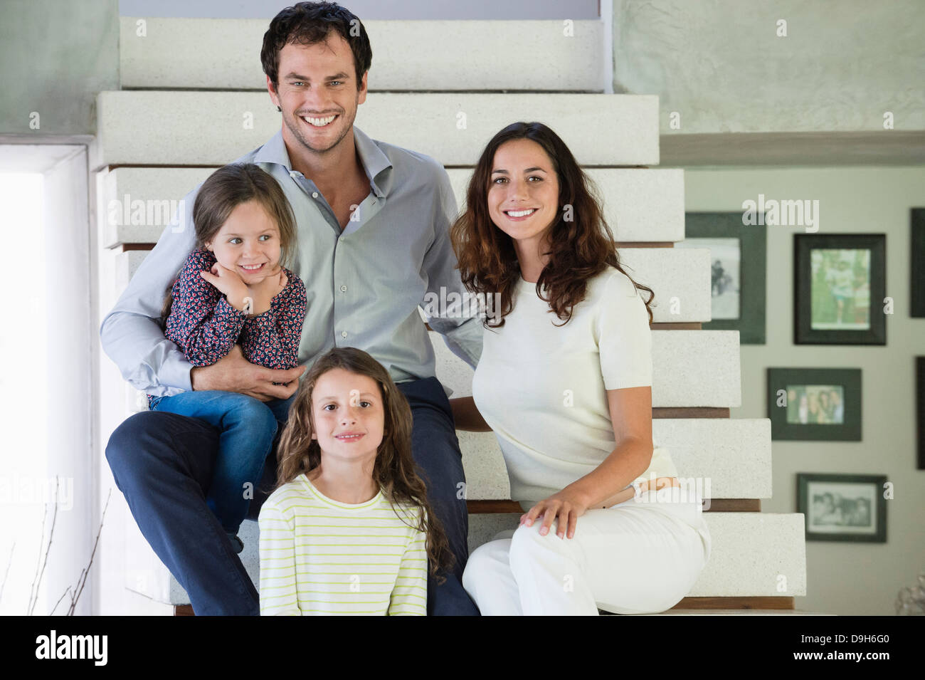 Family four steps portrait hi-res stock photography and images - Alamy