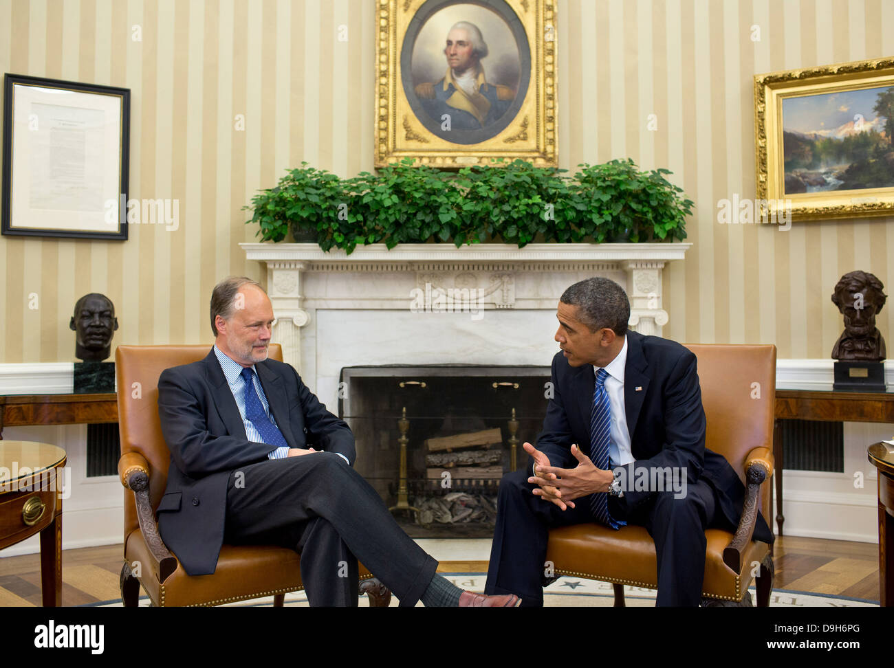 US President Barack Obama meets with US Ambassador to Afghanistan Jim Cunningham in the Oval ...