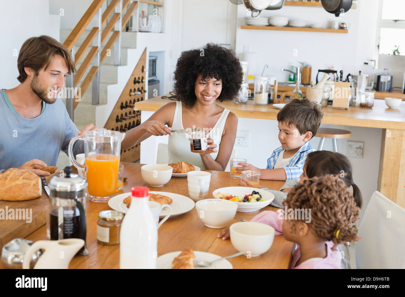 Family at breakfast table Stock Photo - Alamy