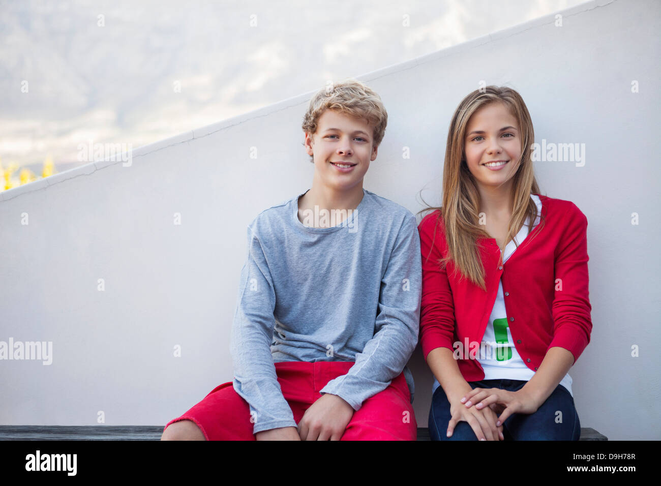 Two friends smiling Stock Photo - Alamy