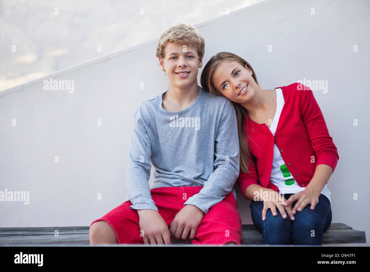 Two friends smiling Stock Photo - Alamy