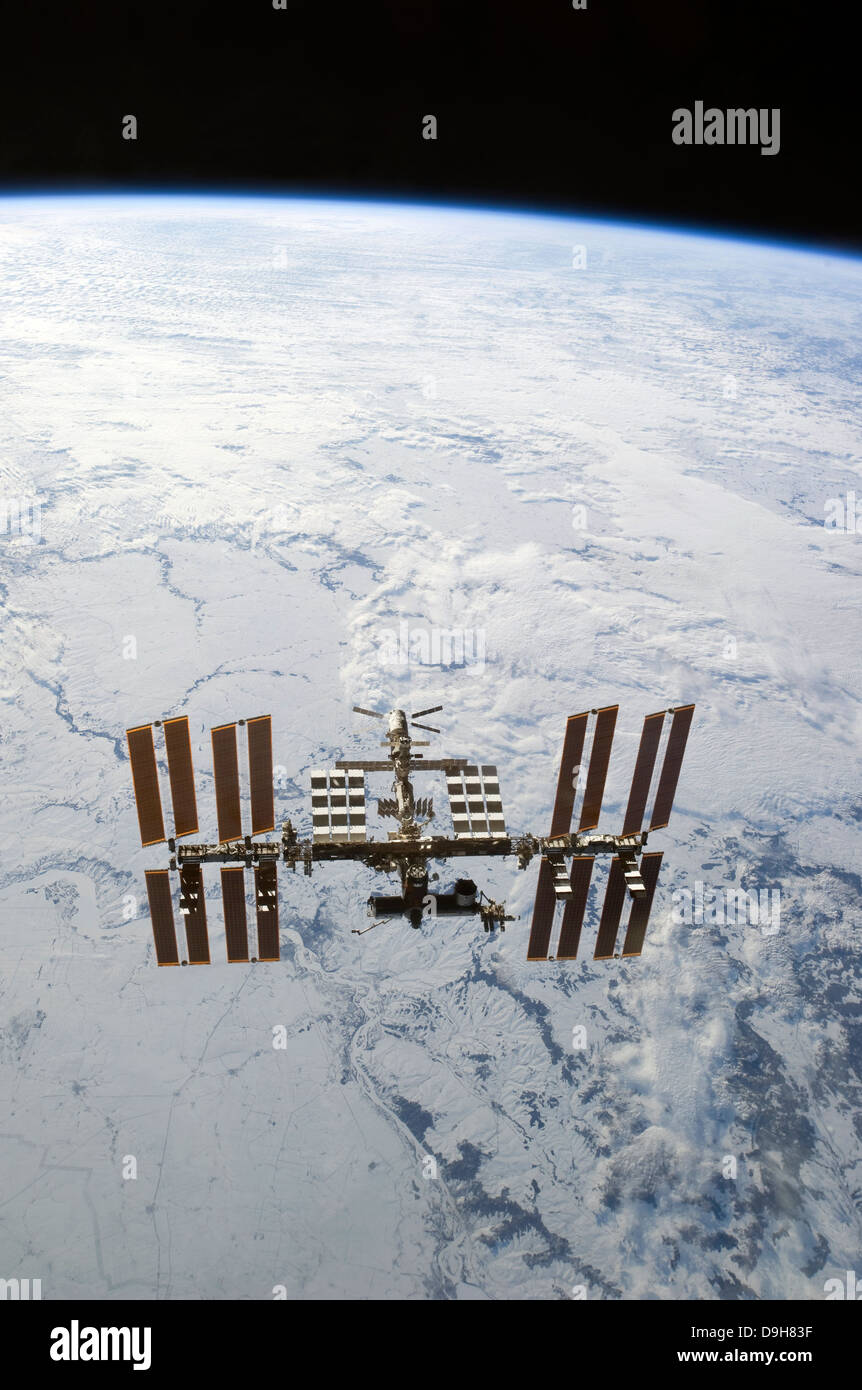 March 7, 2011 - The International Space Station in orbit above Earth ...