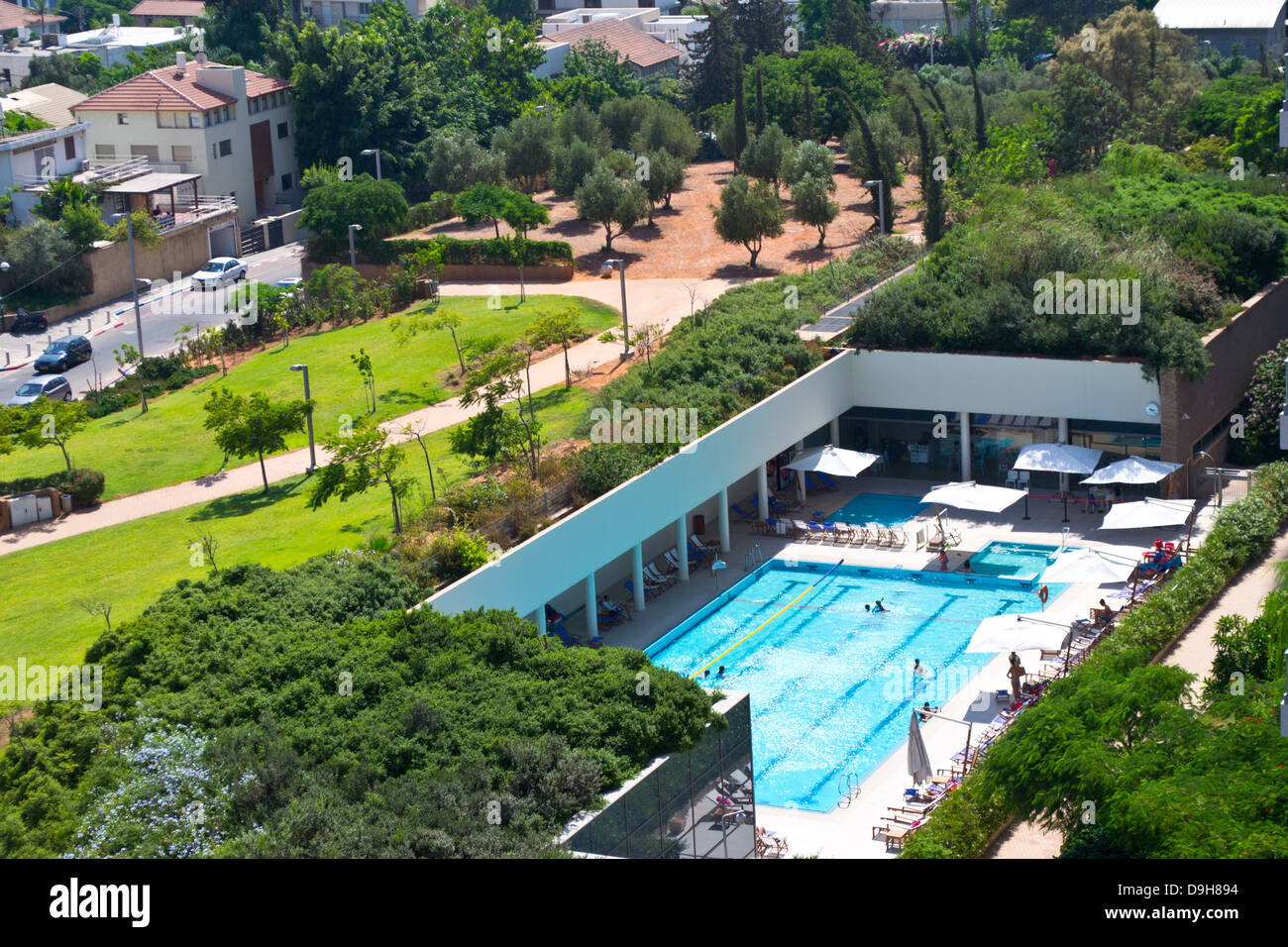 Outdoor swimming pool between trees Stock Photo - Alamy