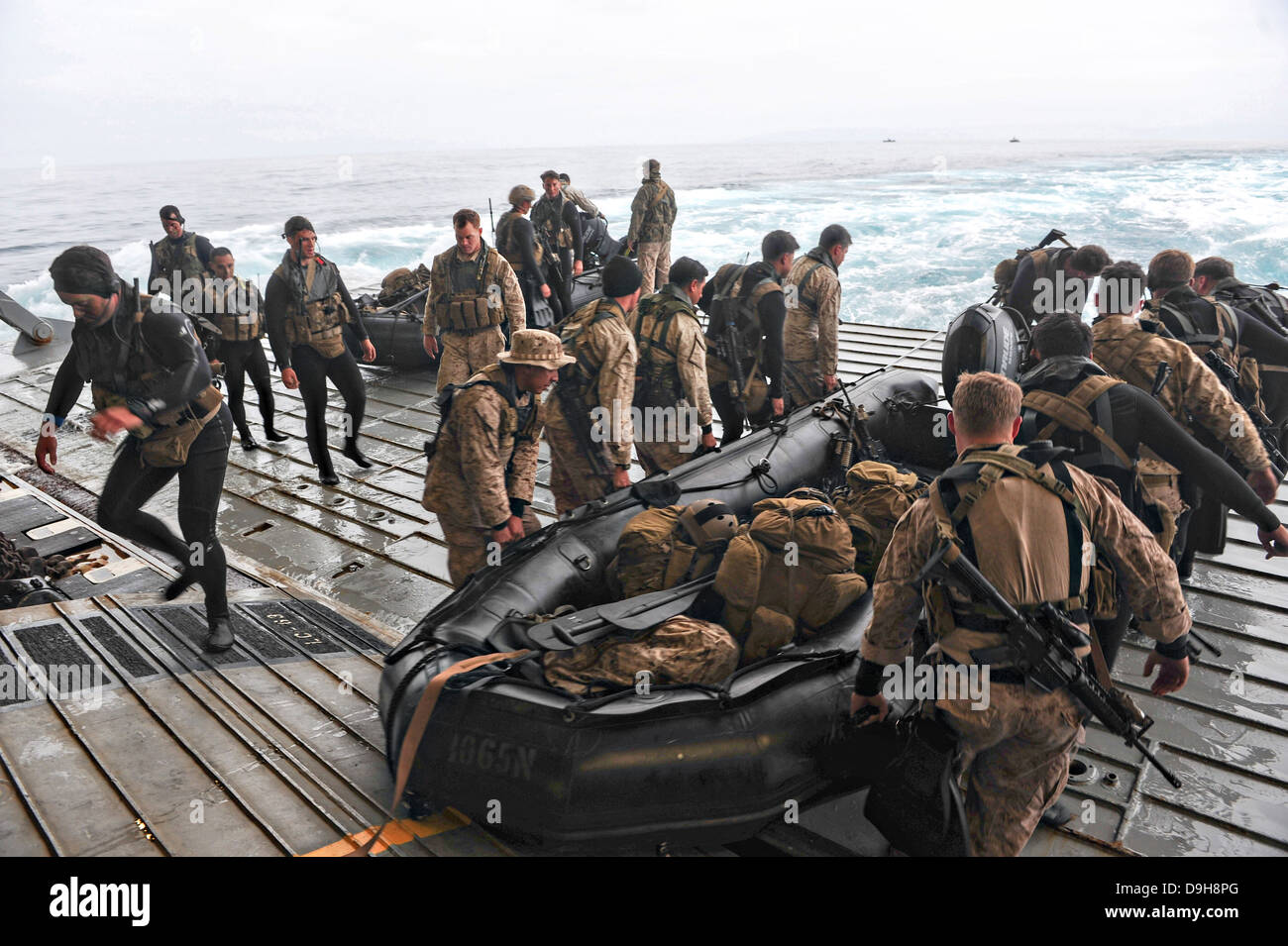 US Marines from the 13th Marine Expeditionary Unit launch Combat Rubber ...