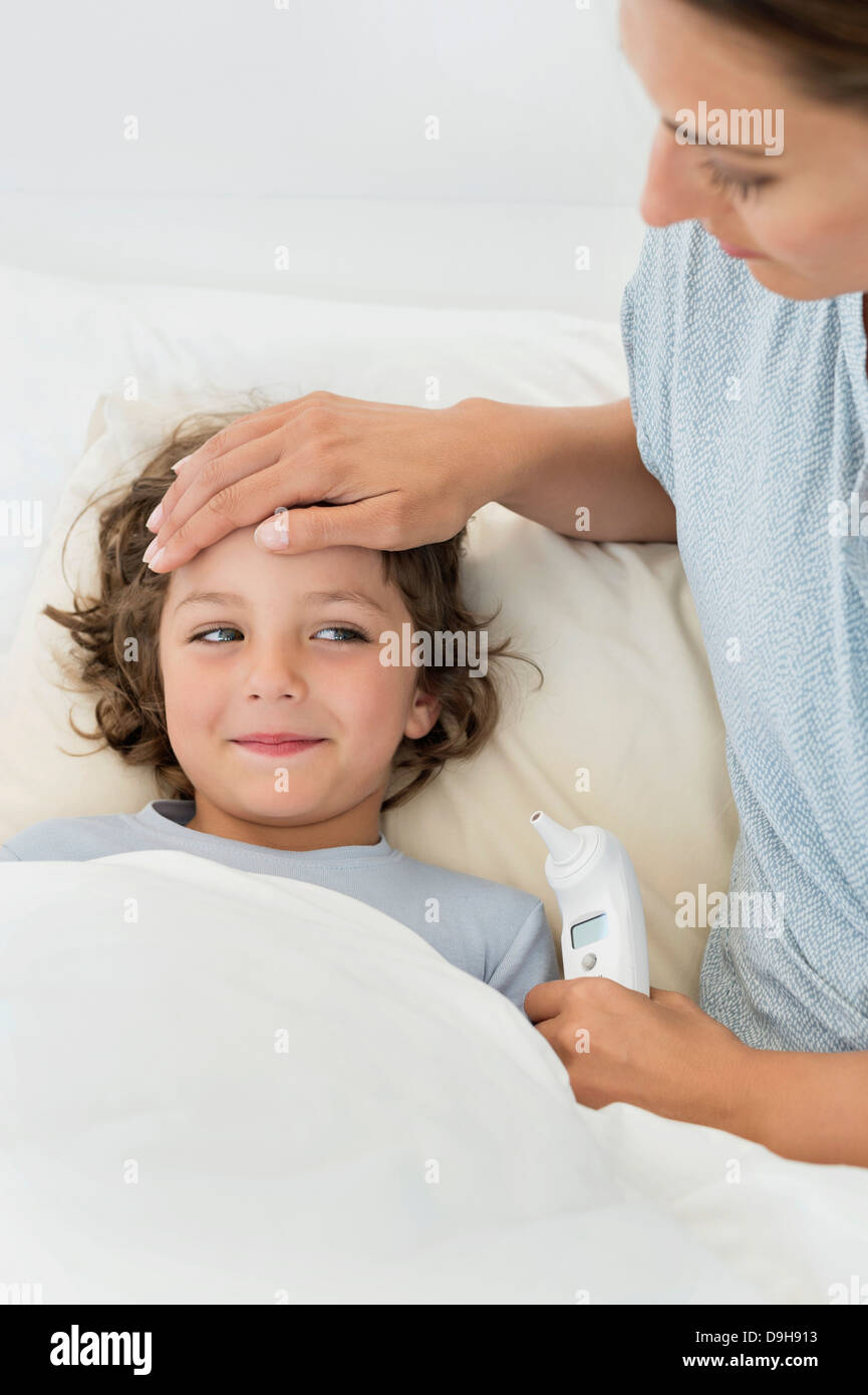 Two women touching forehead hi-res stock photography and images - Alamy