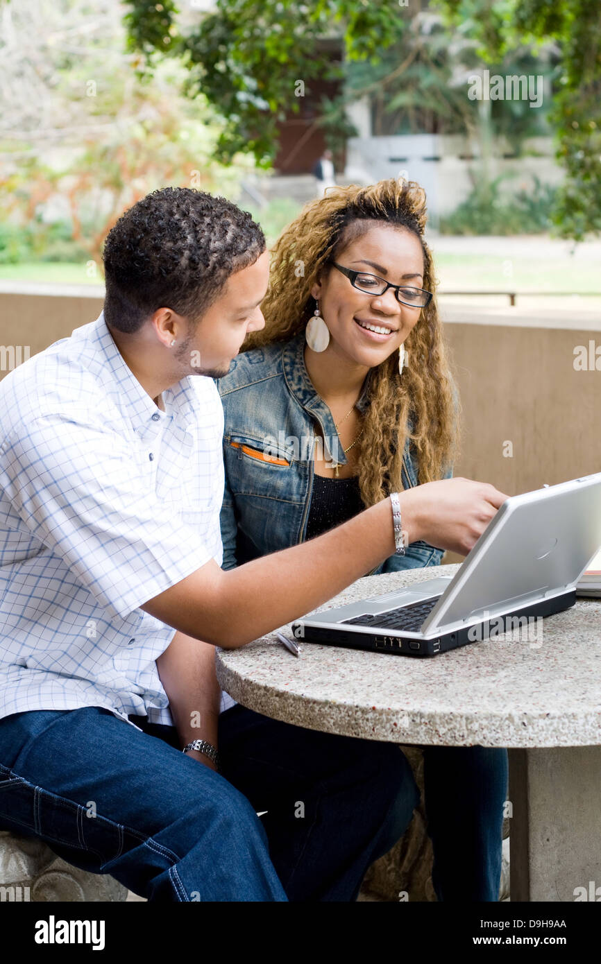 two African college students using laptop computer Stock Photo - Alamy