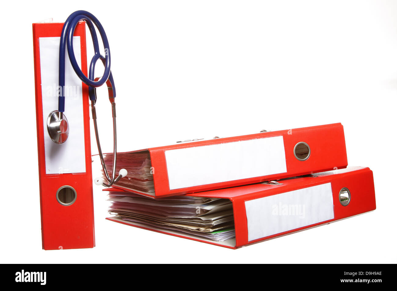 stack of red file folders with blue stethoscope on white background ...