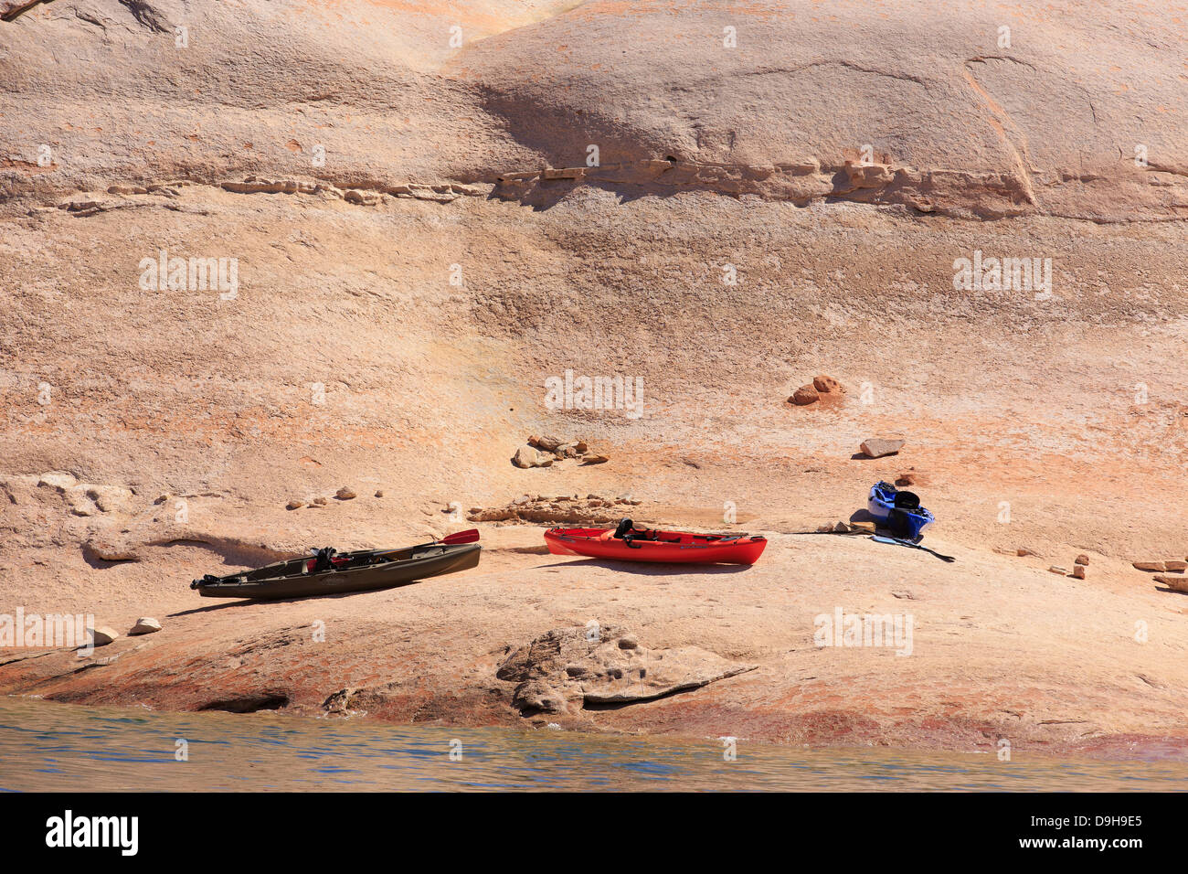 Kayaks on the shore of a cliff in Moki Canyon at Lake Powell, Utah ...