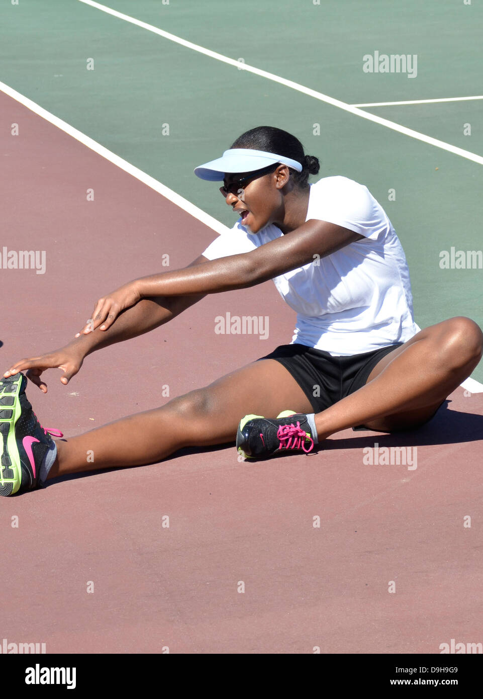 teenage girl doing some exercises Stock Photo - Alamy