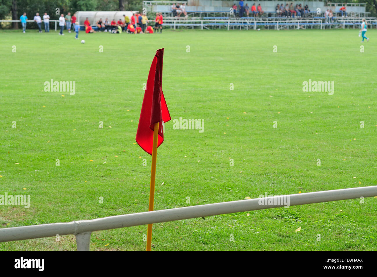 Red corner flag at a football game Stock Photo - Alamy