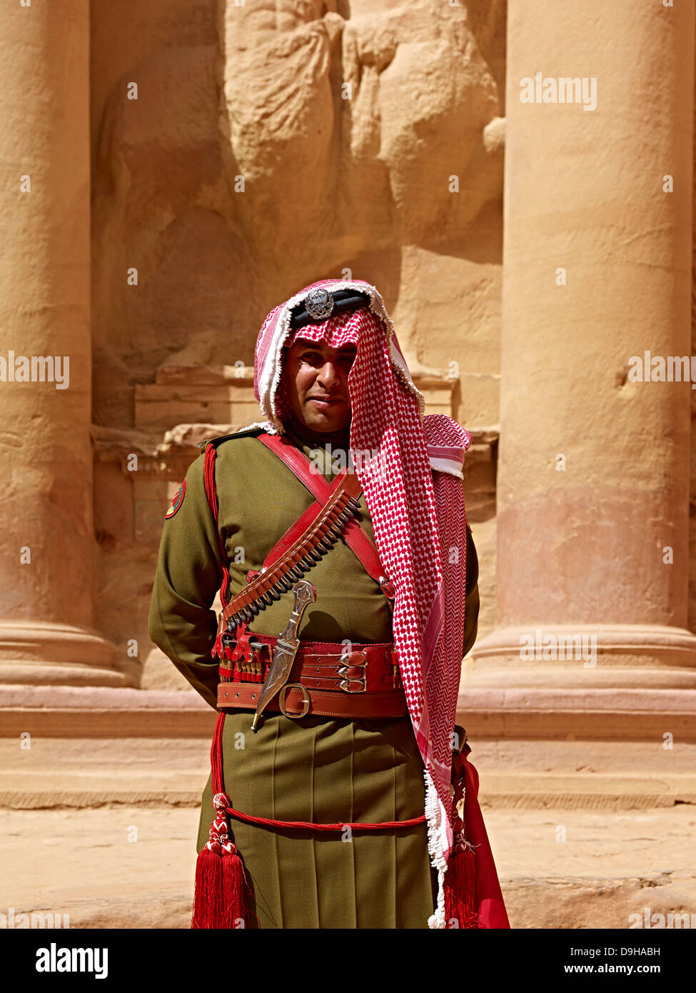 Local Bedouin as a guard in front of the Treasury of archaeological ...