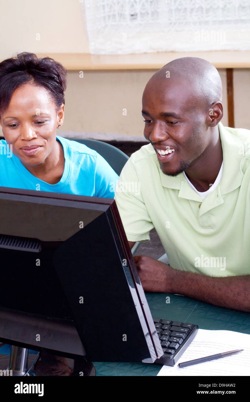 two adult African students studying computer together Stock Photo - Alamy