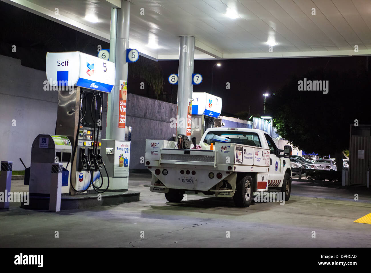 A Chevron gas station with a Freeway rescue truck getting gas on ...