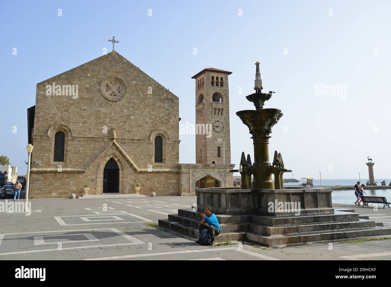Church of the Annunciation and fountain on Mandraki Harbour, City of ...