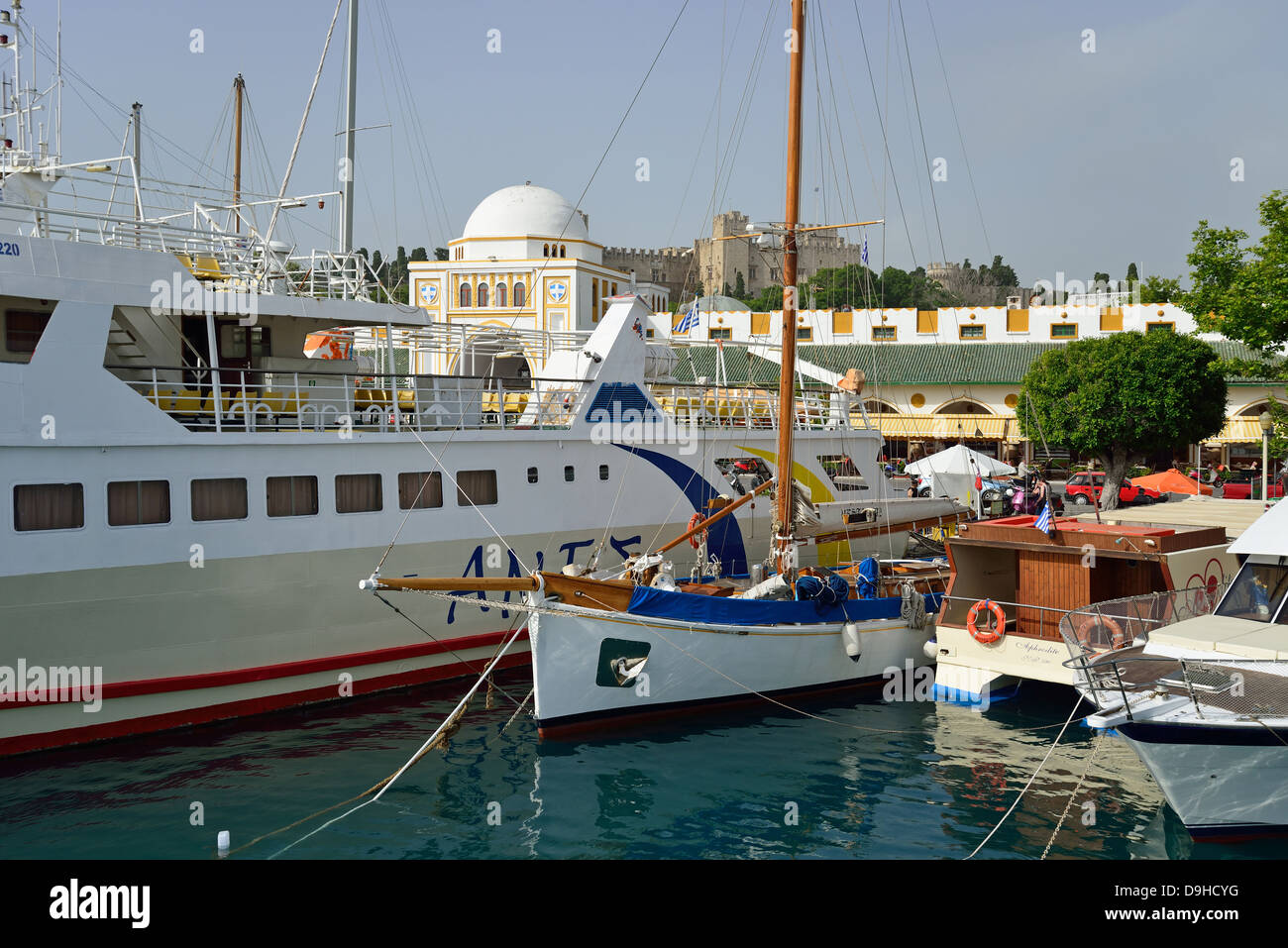 Boats moored in Mandraki Harbour, City of Rhodes, Rhodes (Rodos), The ...