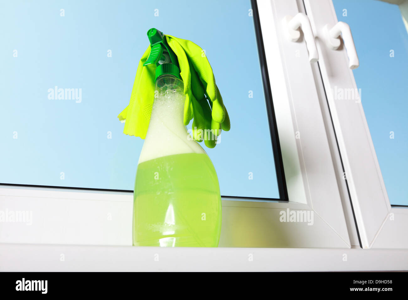 Cleaning window using tools - rag and spray detergent. Spring cleaning ...