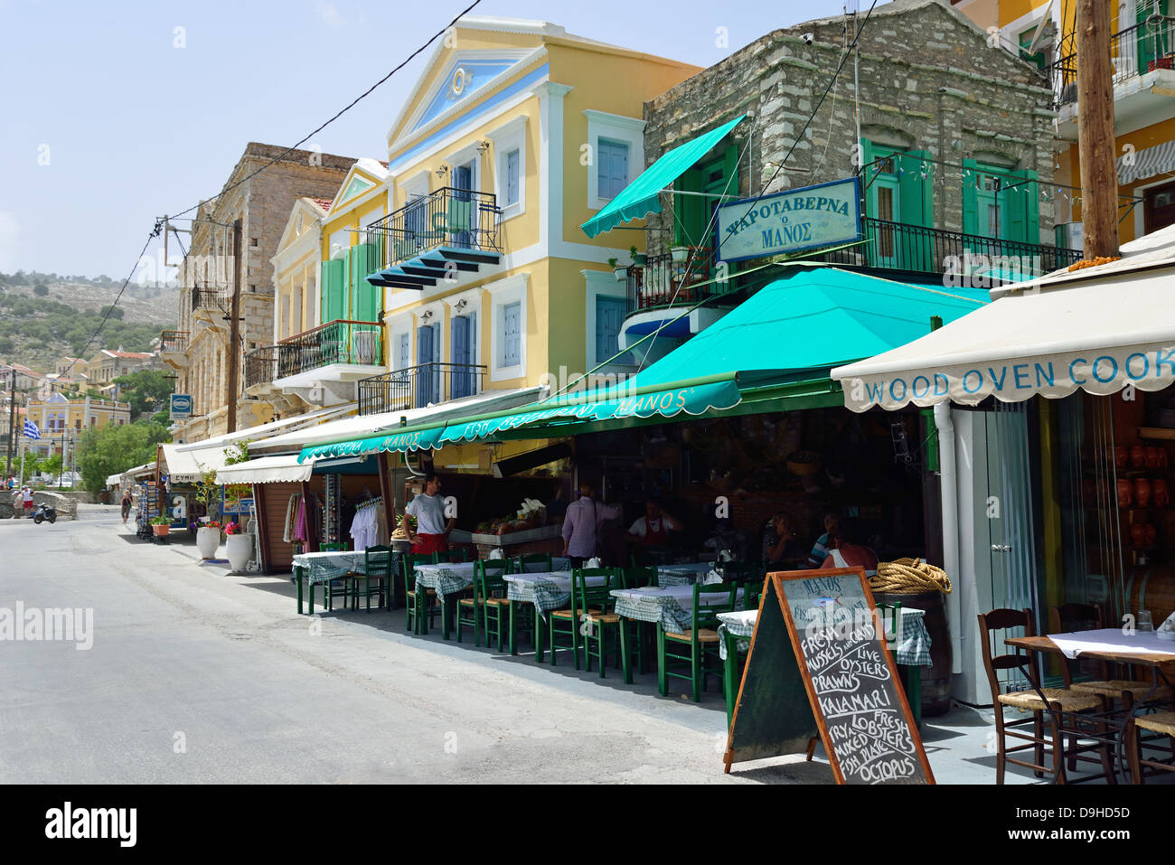 Tavernas on waterfront, Symi (Simi), Rhodes (Rodos) Region, The ...