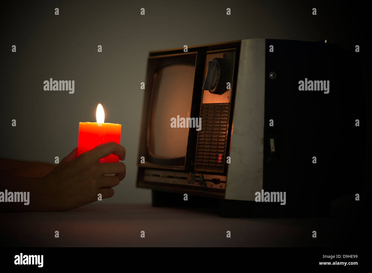 A man with a red candle Stock Photo - Alamy